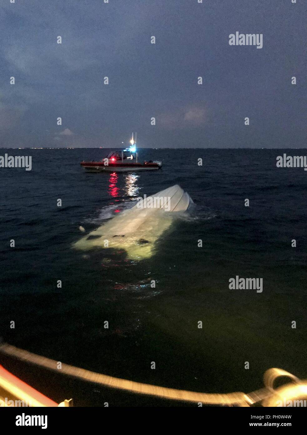 Coast Guard boatcrew members aboard a 29-foot Response Boat-Small II ...