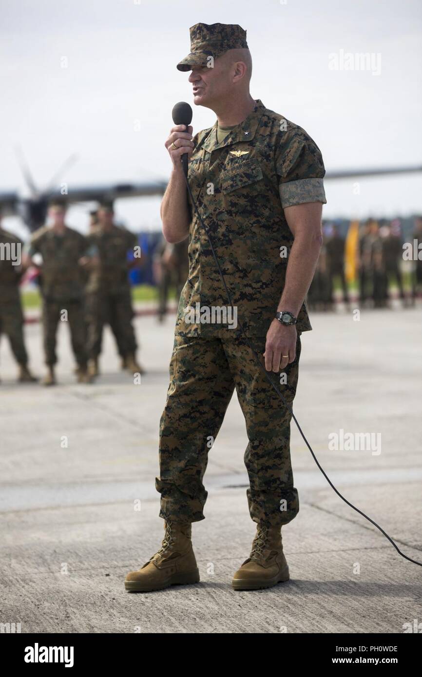 U.S. Marine Corps Brig. Gen. Karsten S. Heckl speaks to the audience ...