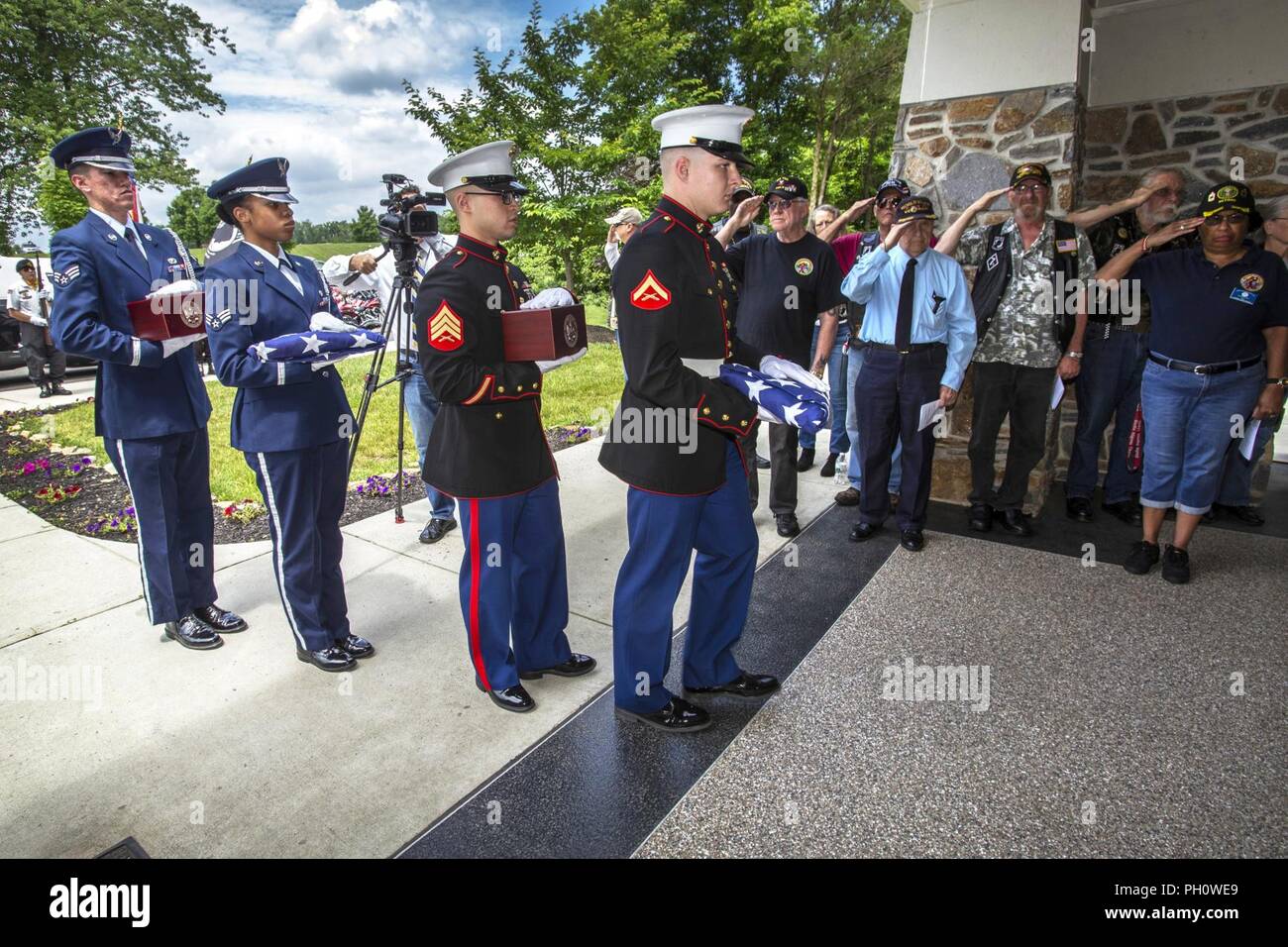 Attendees salute as Honor Guard members pause during the 29th New ...