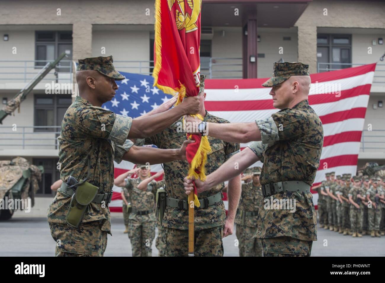 U.S. Marine Corps Lt. Col. Dominique B. Neal, left, the incoming ...