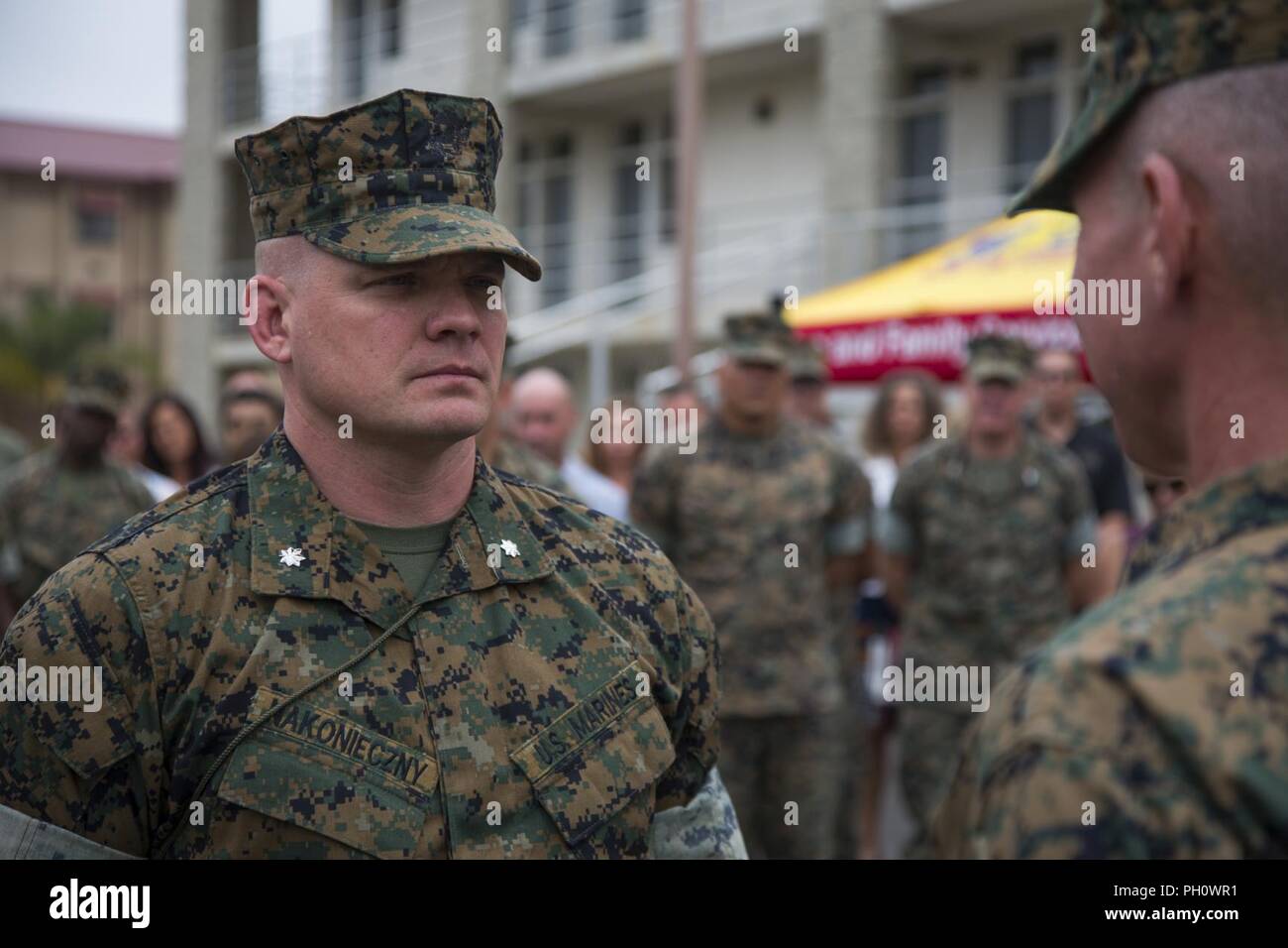U.S. Marine Corps Lt. Col. Michael R. Nakonieczny stands at attention ...