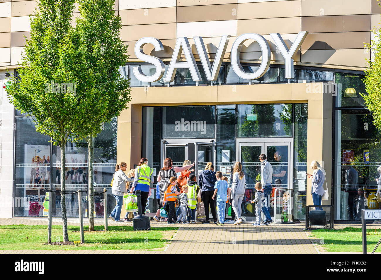 Morning visitors at the Savoy cinema, Corby town centre, England Stock ...
