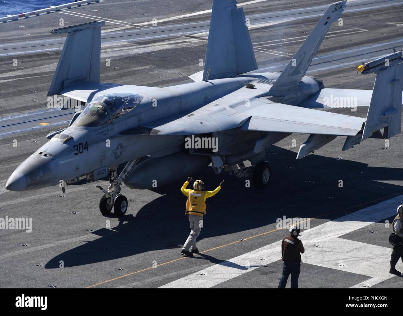 PHILIPPINE SEA (June 20, 2018) A Sailor aboard the aircraft carrier USS Ronald Reagan (CVN 76 ...