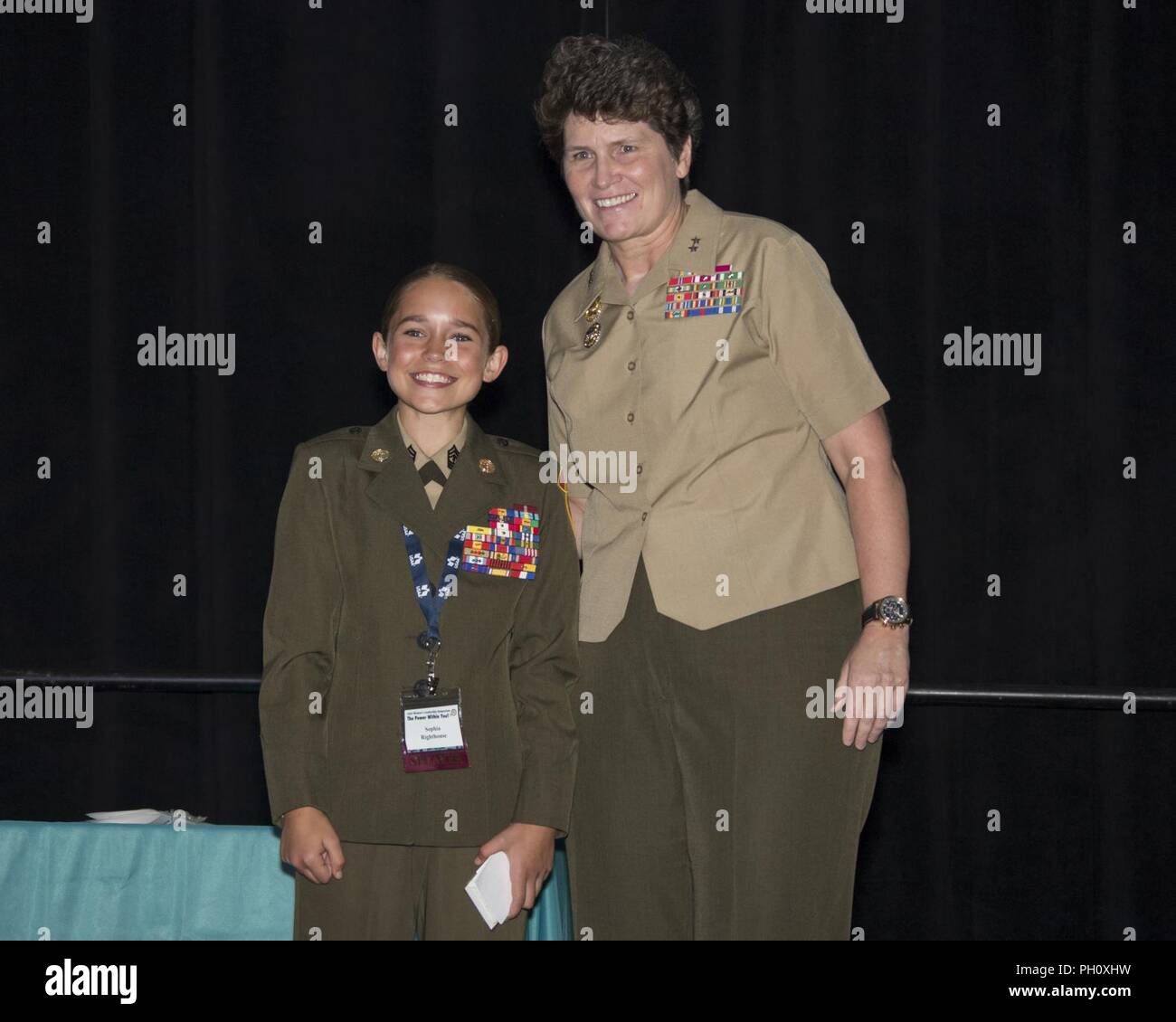 U.S. Marine Corps Maj. Gen. Loretta Reynolds, right, commanding officer ...