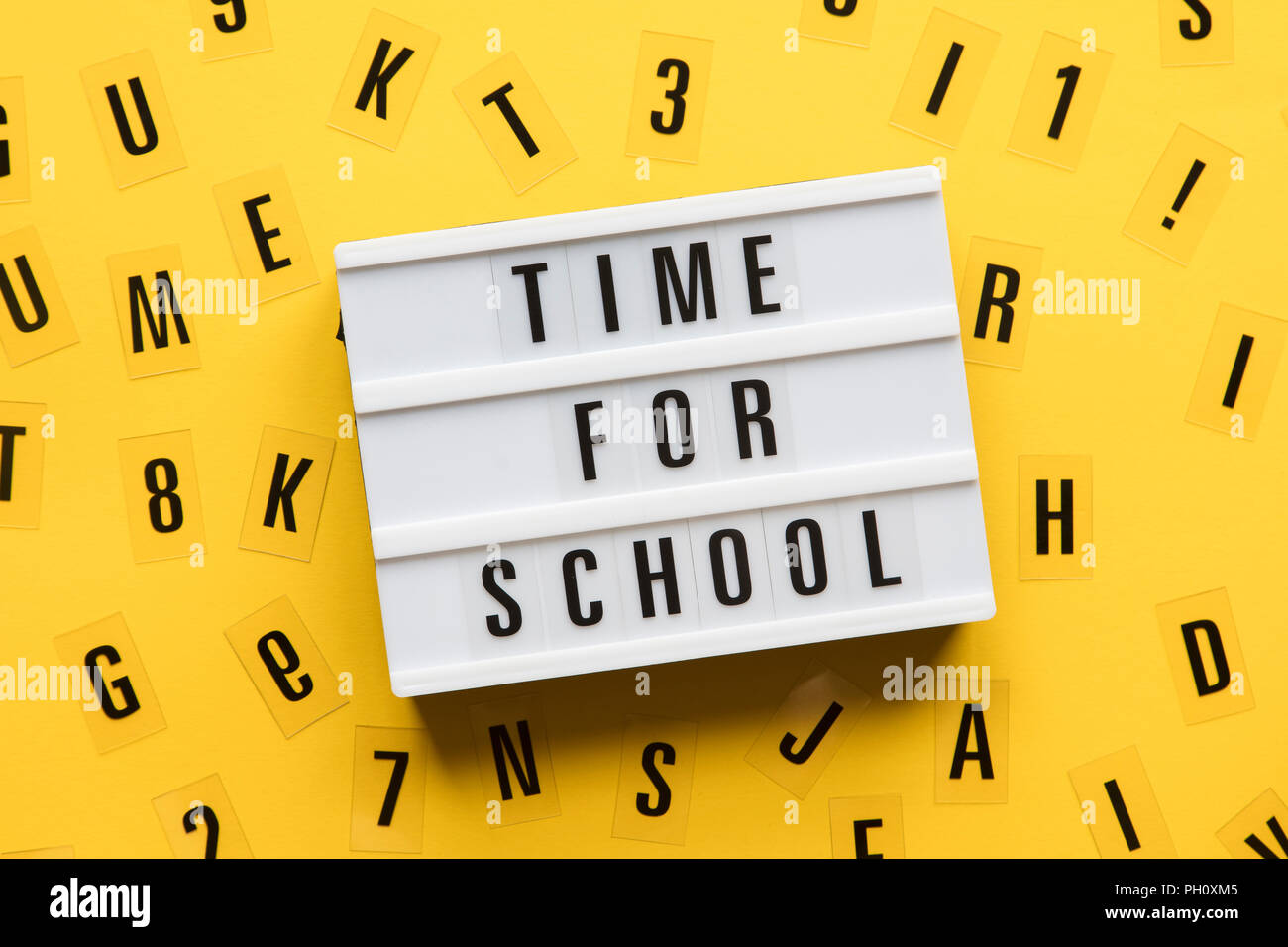 Time for school lightbox message on a bright yellow background Stock ...
