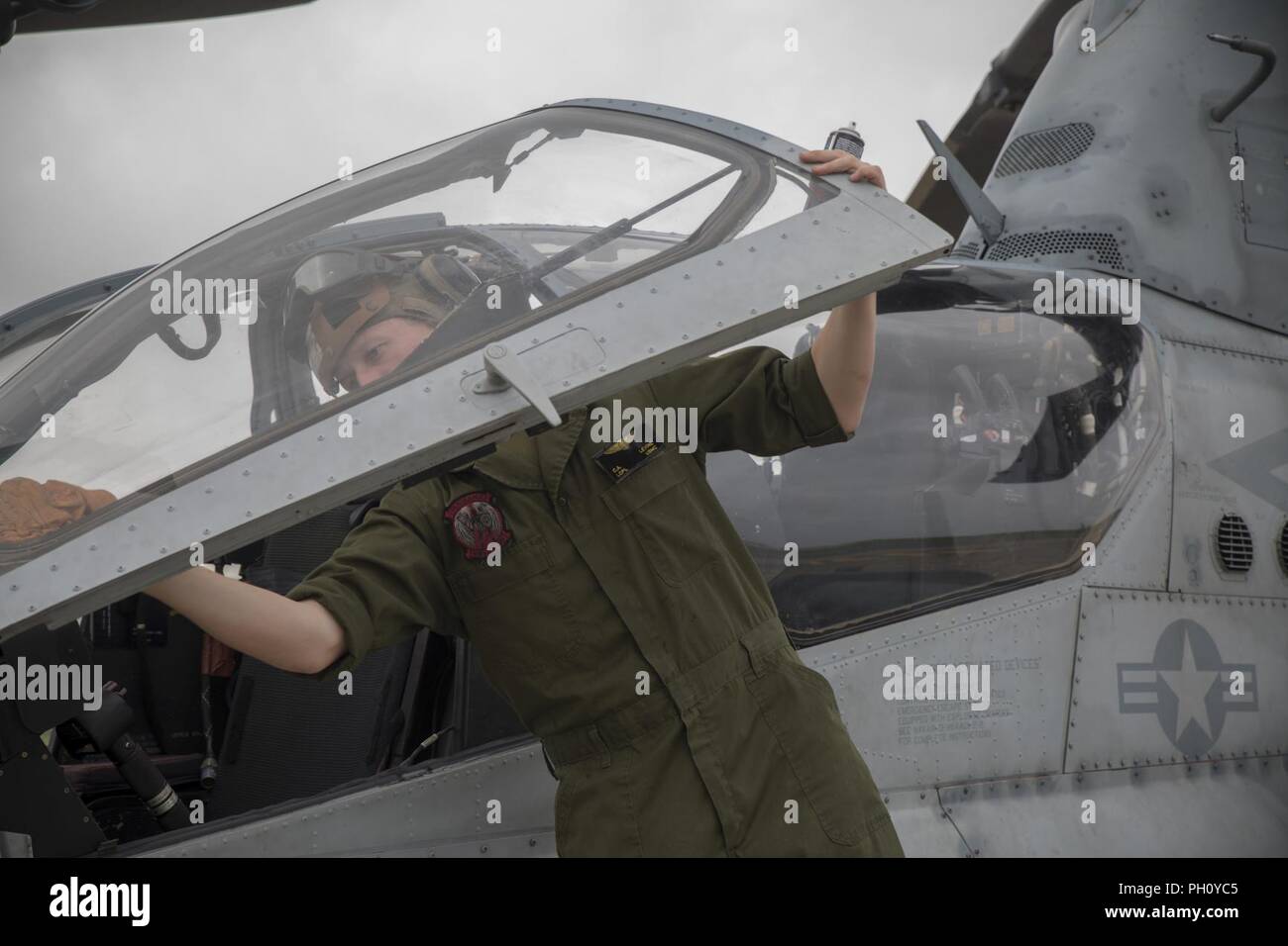 Lance Cpl. Cade Levine preforms pre-flight checks on the AH-1Z Viper at ...