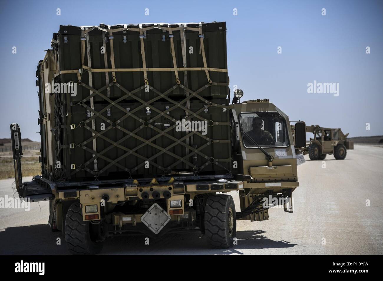 A U.S. Air Force aerial porter assigned to the 387th Air Expeditionary ...