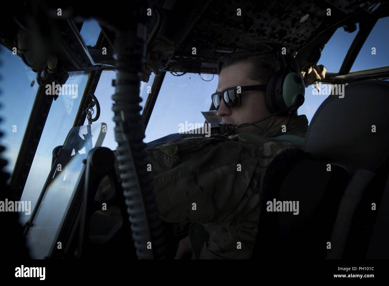 A pilot with the 4th Special Operations Squadron flies an AC-130U ...