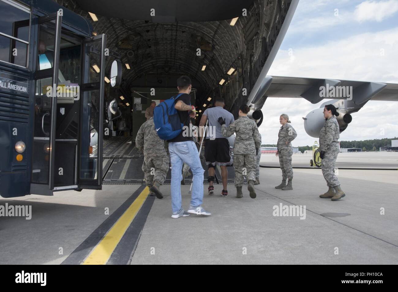 Airmen from the 179th Airlift Wing, Mansfield, Ohio, assist in outbound ...