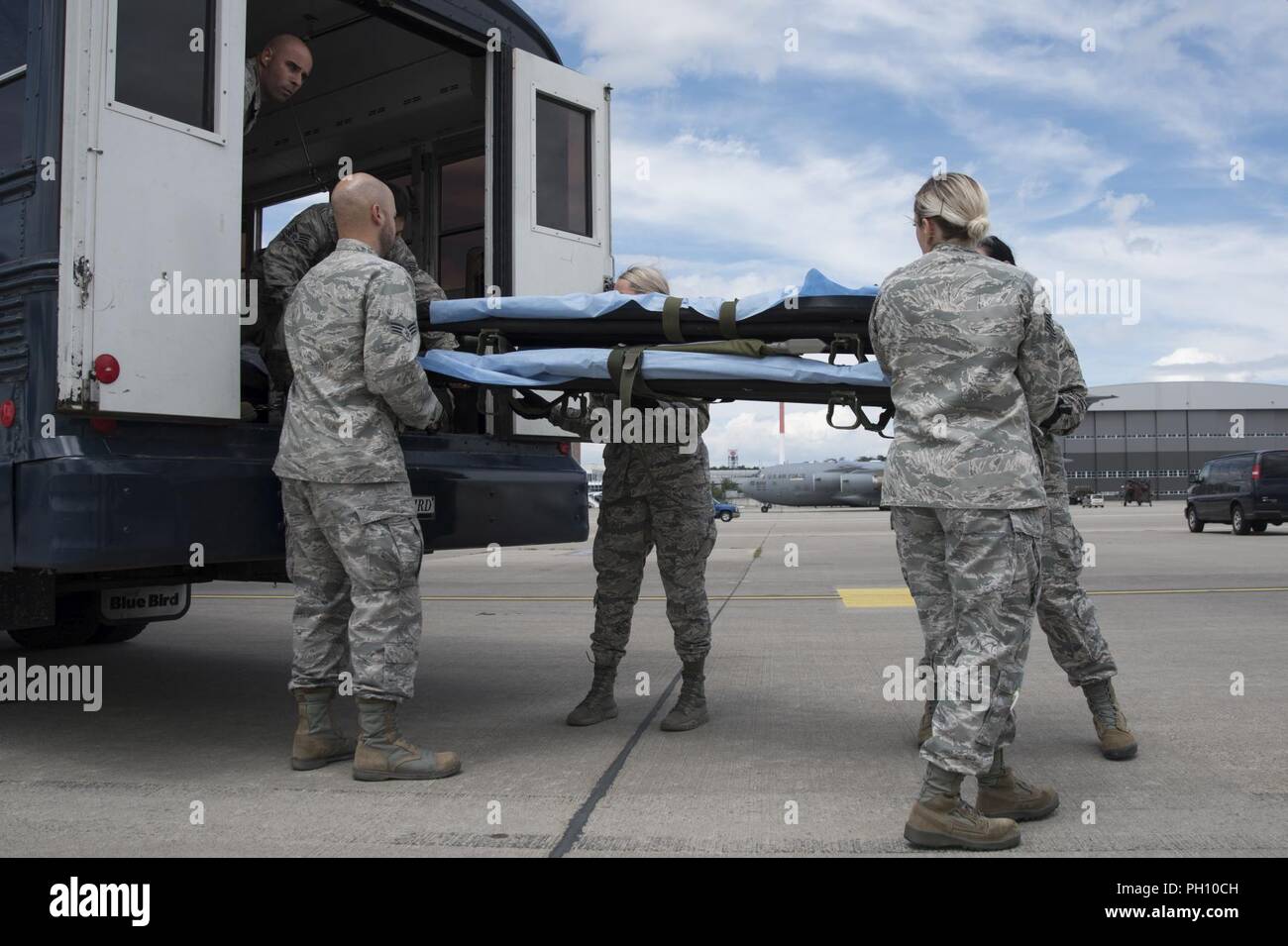 Airmen from the 179th Airlift Wing, Mansfield, Ohio, assist in outbound ...