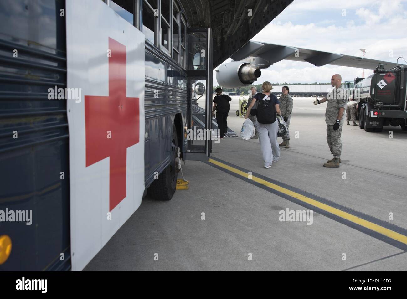 Airmen from the 179th Airlift Wing, Mansfield, Ohio, assist in outbound ...