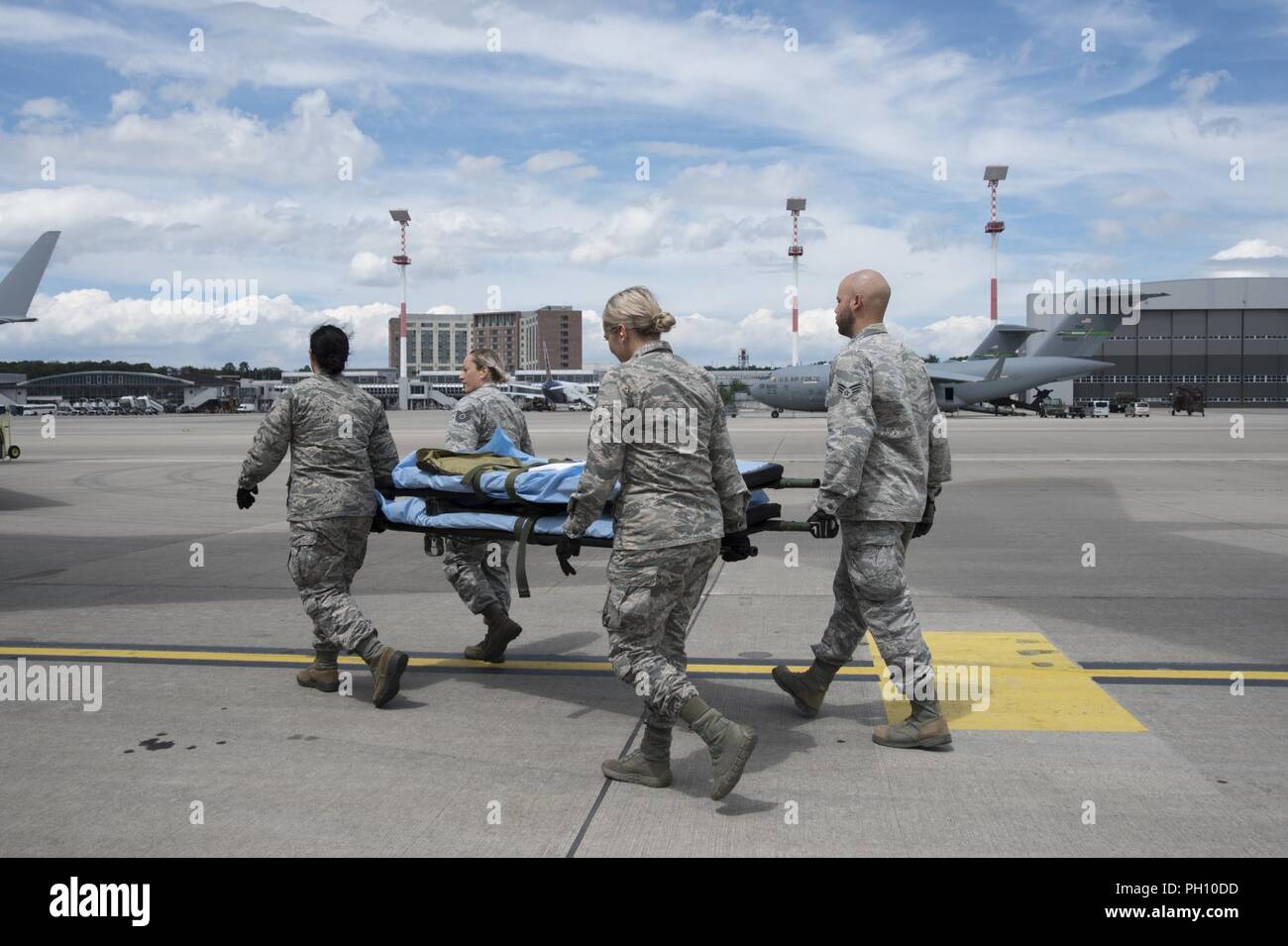 Airmen from the 179th Airlift Wing, Mansfield, Ohio, assist in outbound ...