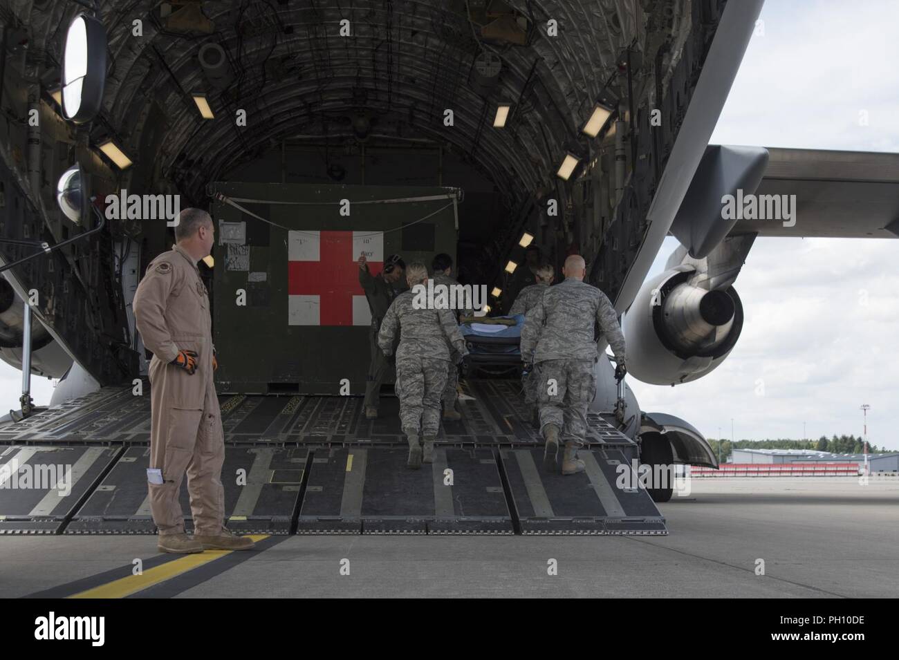 Airmen from the 179th Airlift Wing, Mansfield, Ohio, assist in outbound ...