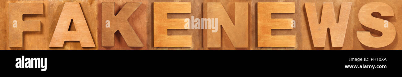 Fake news words made of vintage wooden letters. Fake news sign Stock ...