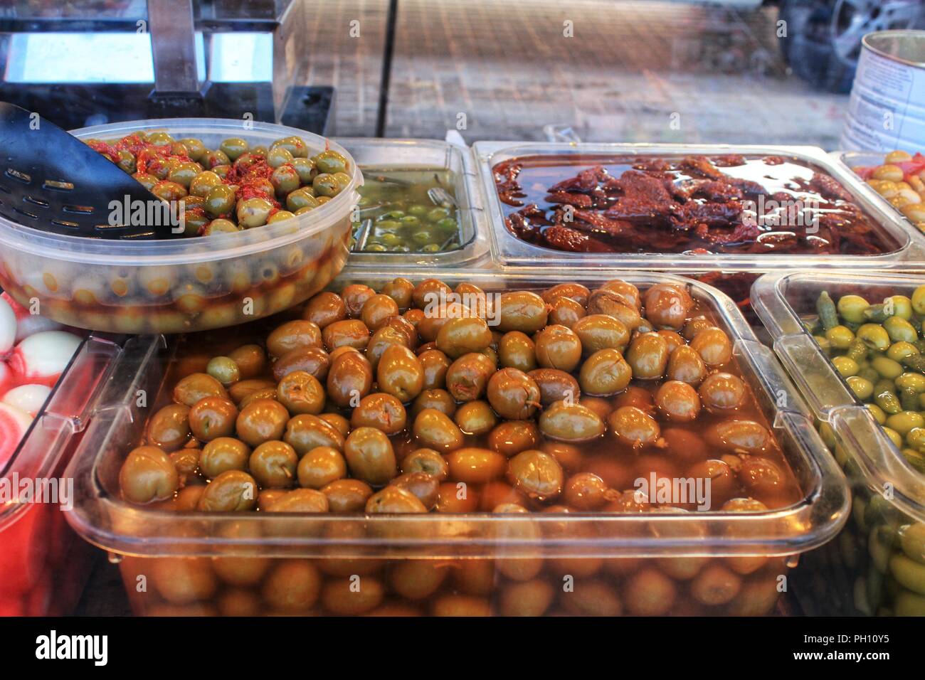 Olives and pickles at a market stall in Alicante Stock Photo - Alamy