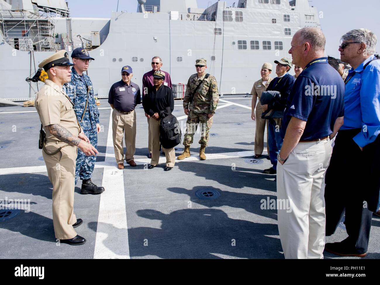 Civilian employers of Reserve Sailors tour the littoral combat ship USS ...