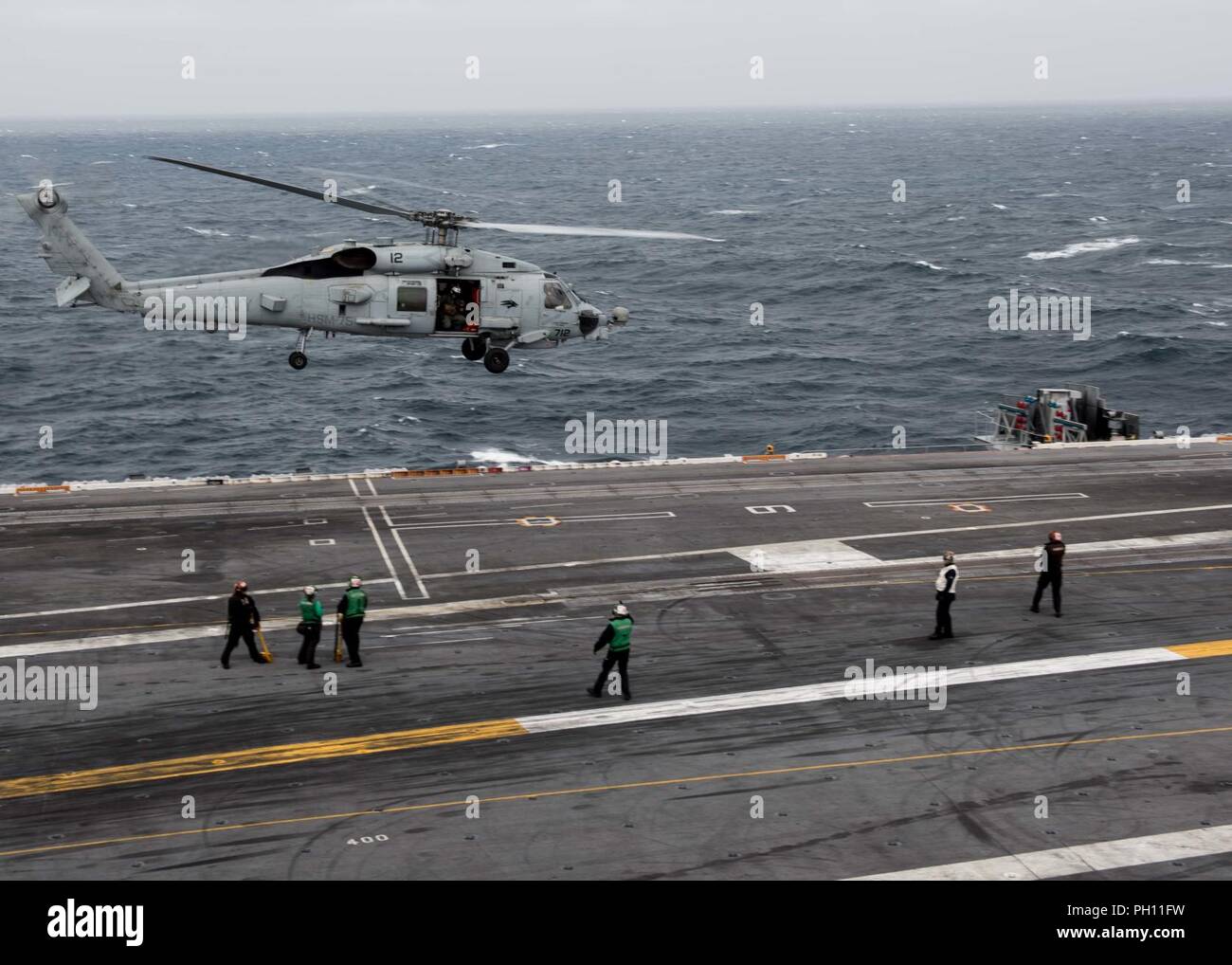 OCEAN (June 22, 2018) An MH-60R Sea Hawk helicopter assigned to ...