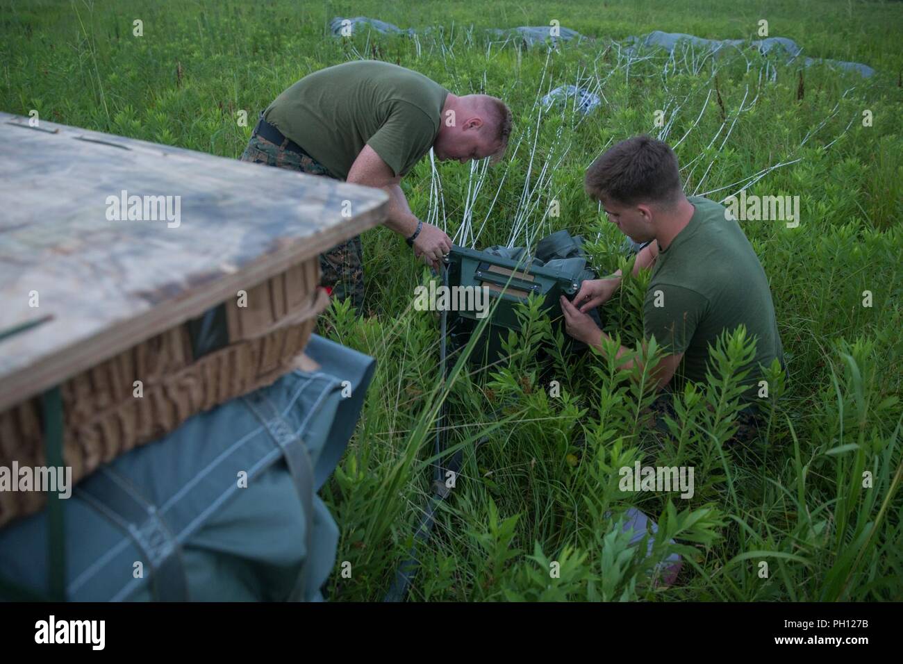 U.S. Marine Corps Sgt. Drake Koontz, left, and Sgt. David Tamburino ...