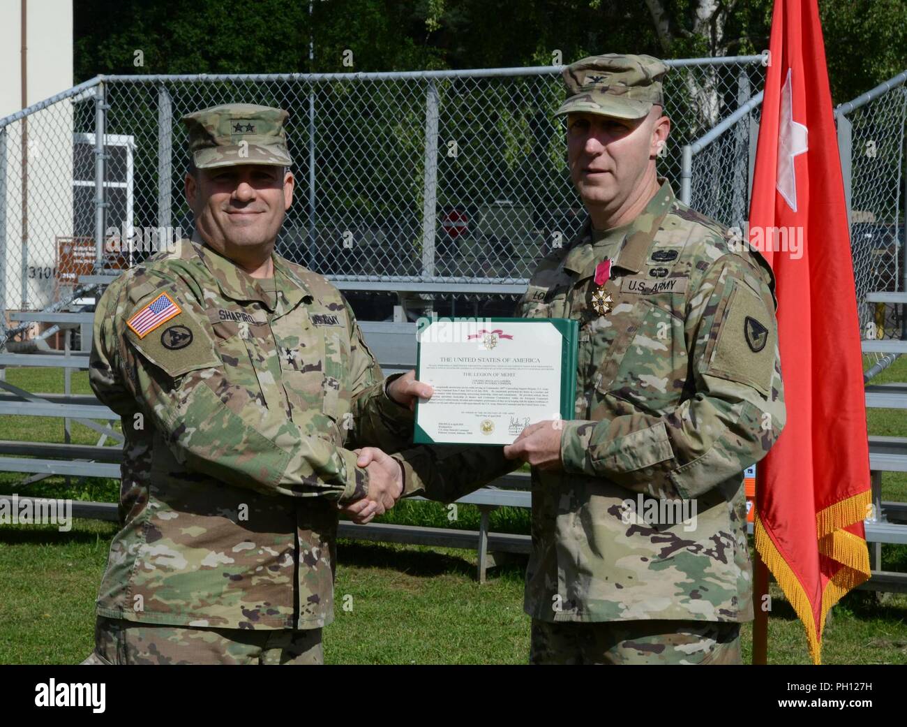 Maj. Gen. Steven A. Shapiro, commanding general, 21st Theater Sustainment Command, presents the ...