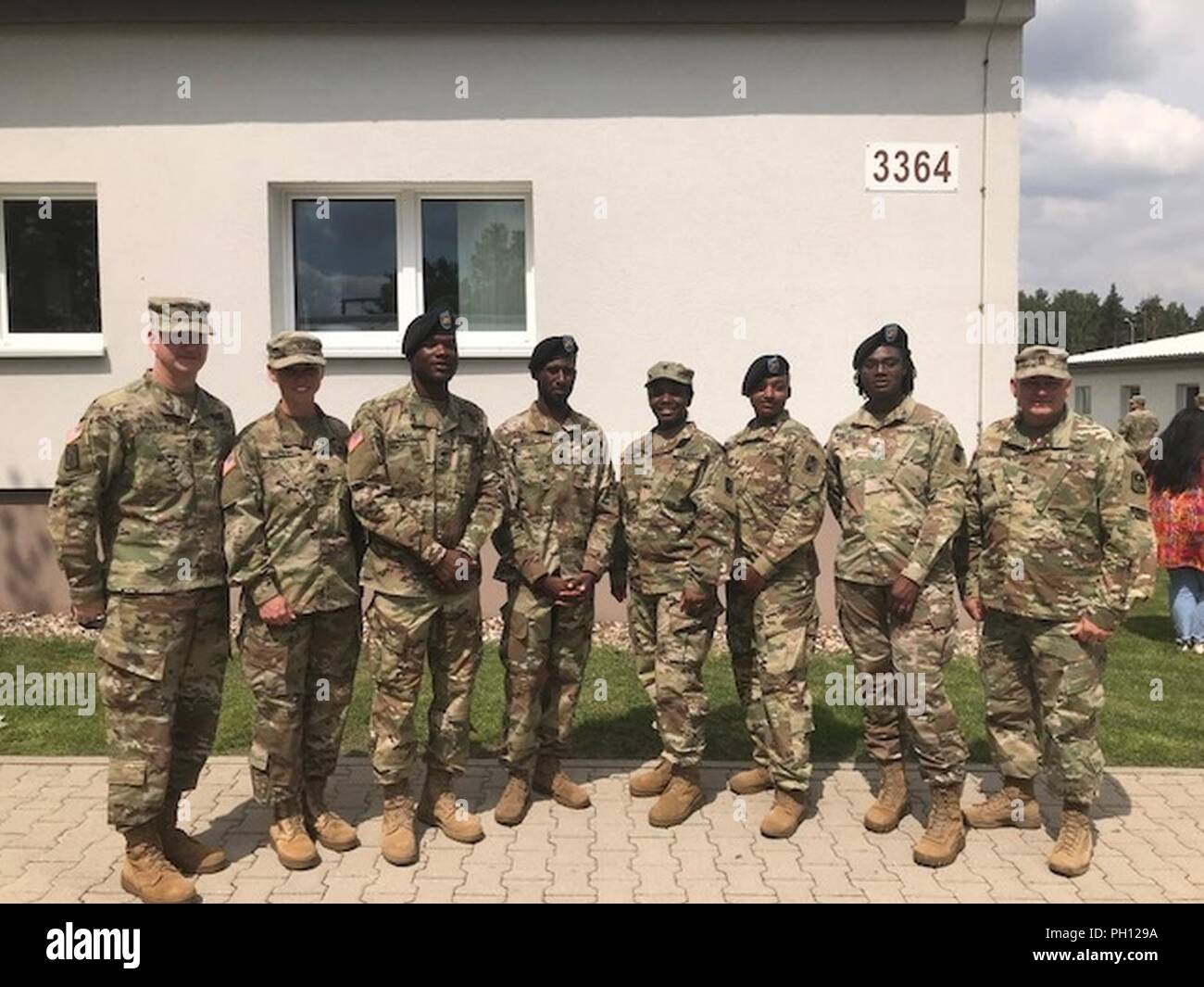 Col. Richard A. Wholey Jr. (left), Spc. Hope Martin (second from left ...