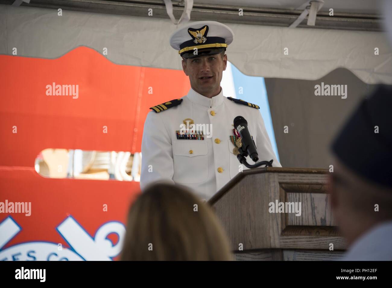 Lt. Cmdr. Brendan Harris, commanding officer of the Coast Guard Cutter ...
