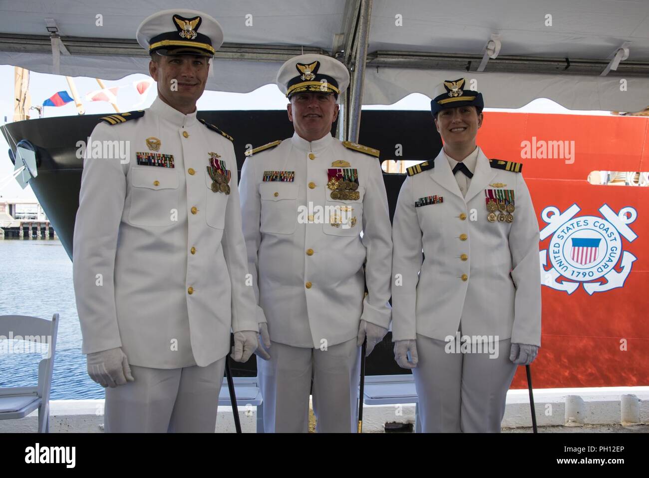 Lt. Cmdr. Margaret Kennedy (right) assumes command of the Coast Guard ...
