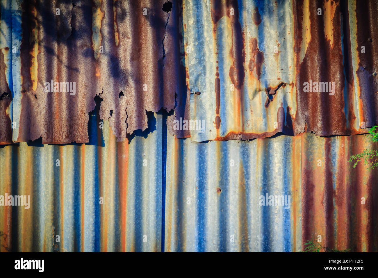 Background texture of the wall of old zinc sheet, metal sheet with ...