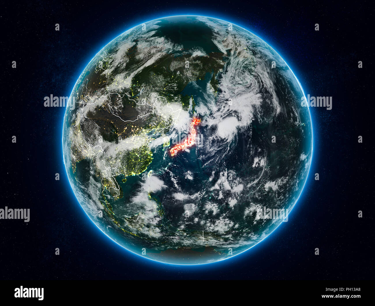 Japan from space on planet Earth at night with visible country borders ...