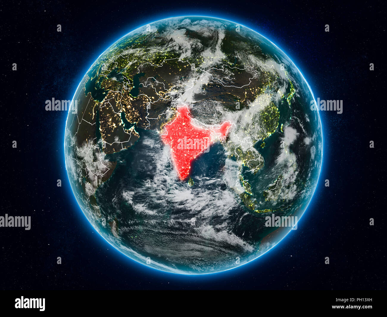 India from space on planet Earth at night with visible country borders ...
