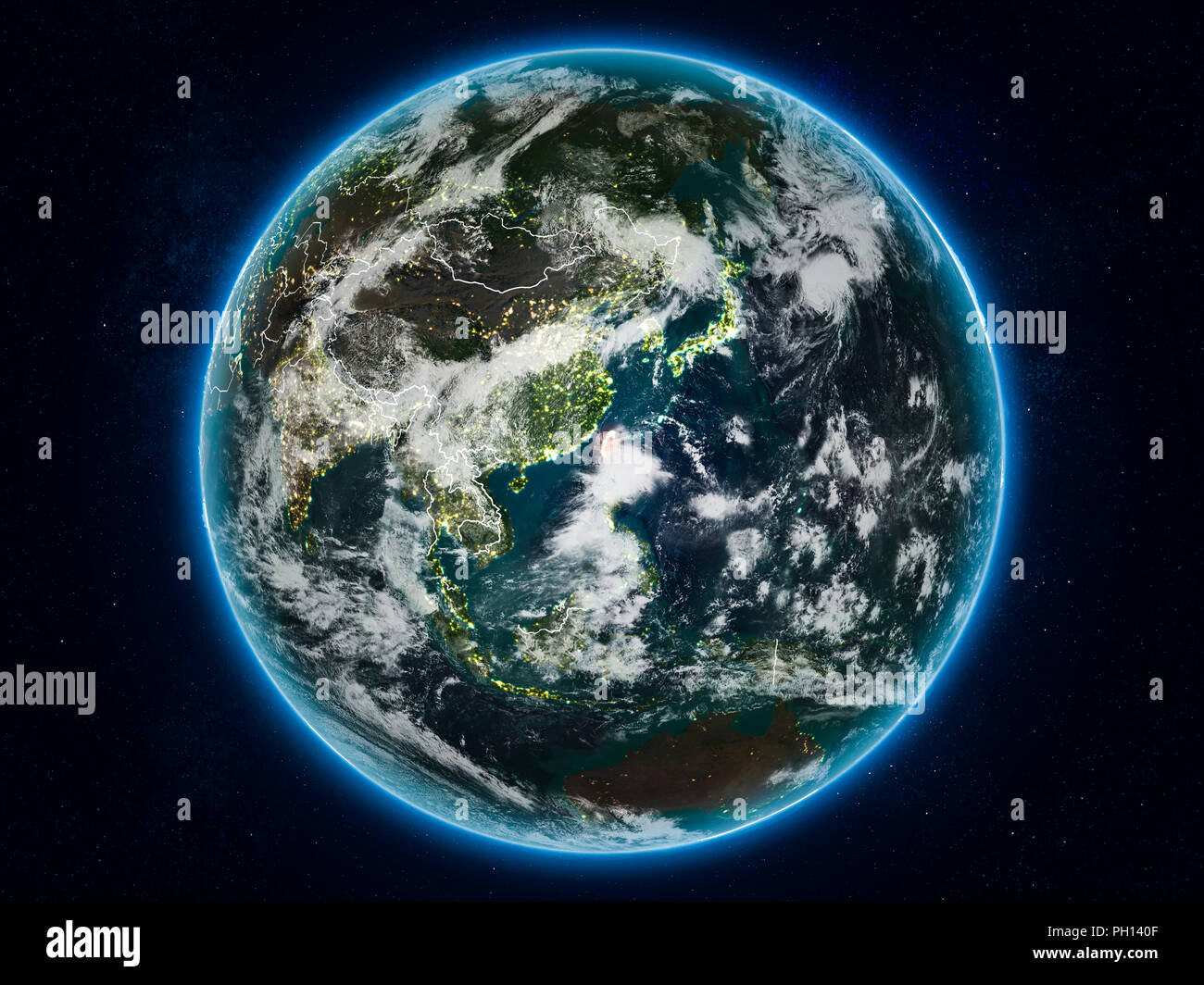 Taiwan from space on planet Earth at night with visible country borders ...