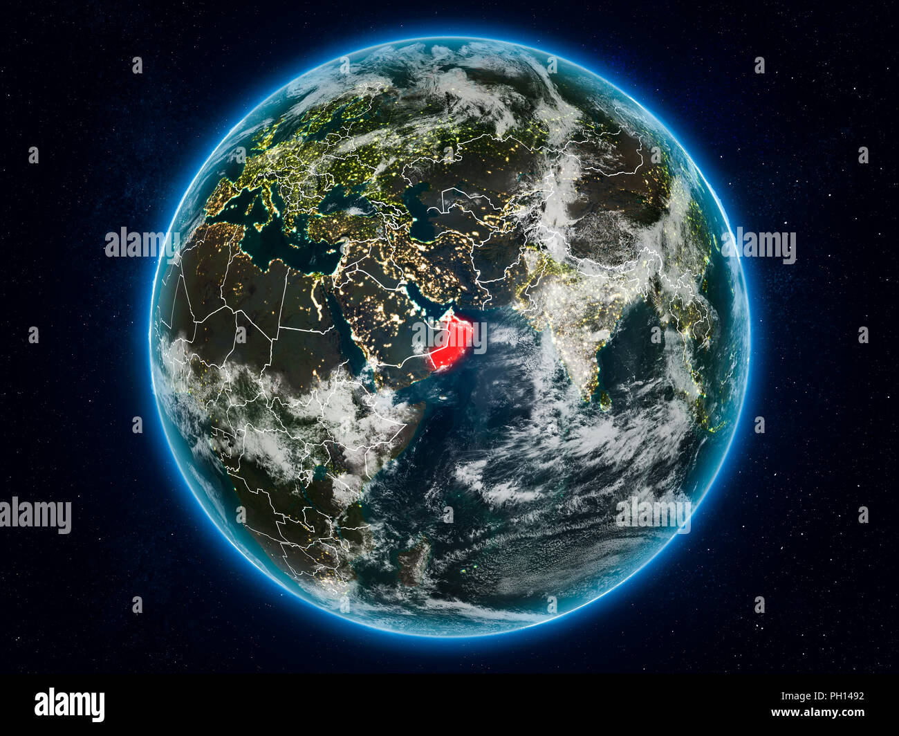 Oman from space on planet Earth at night with visible country borders ...