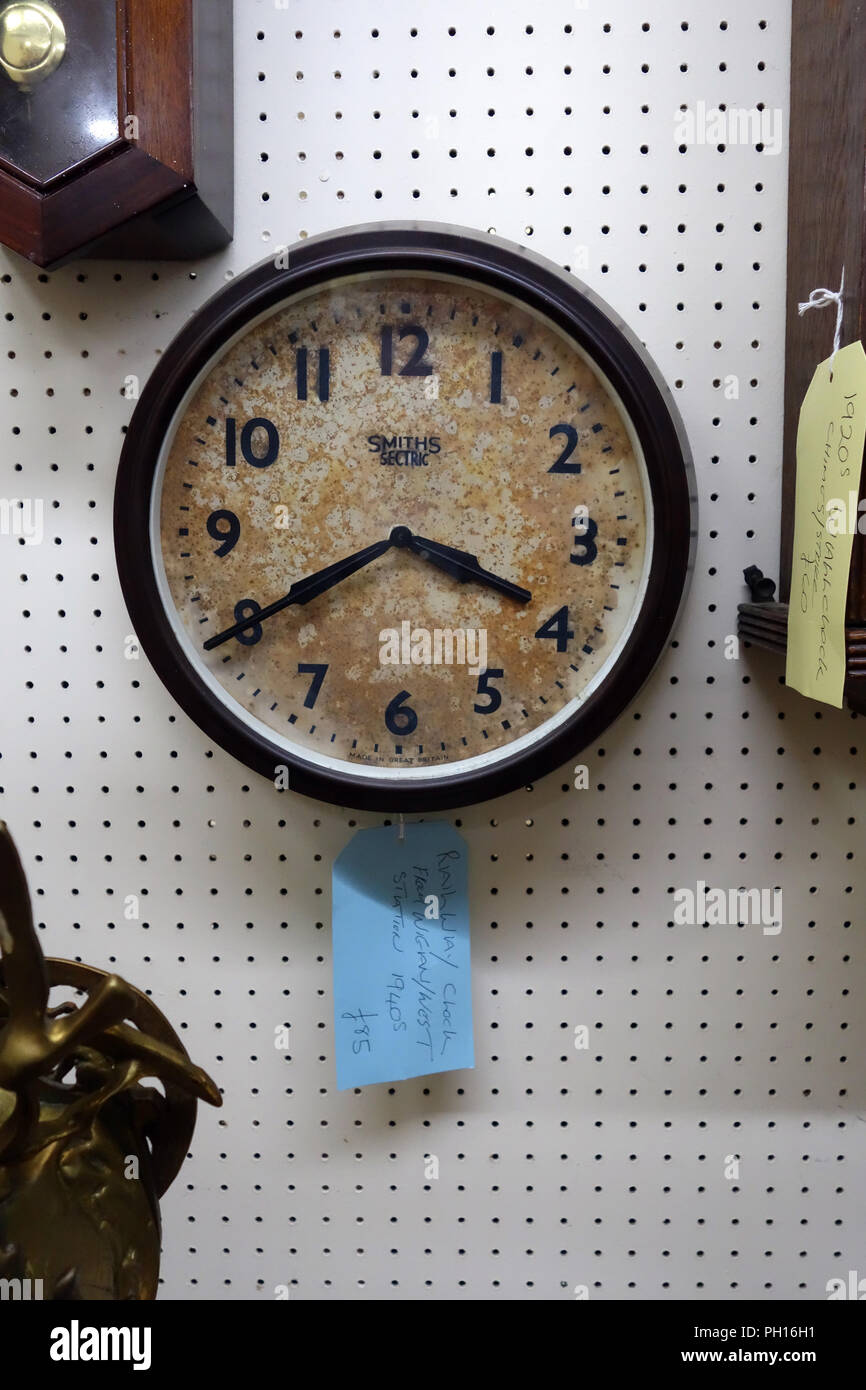 Antique large wall clock one of the items of Bric-à-brac on display an ...