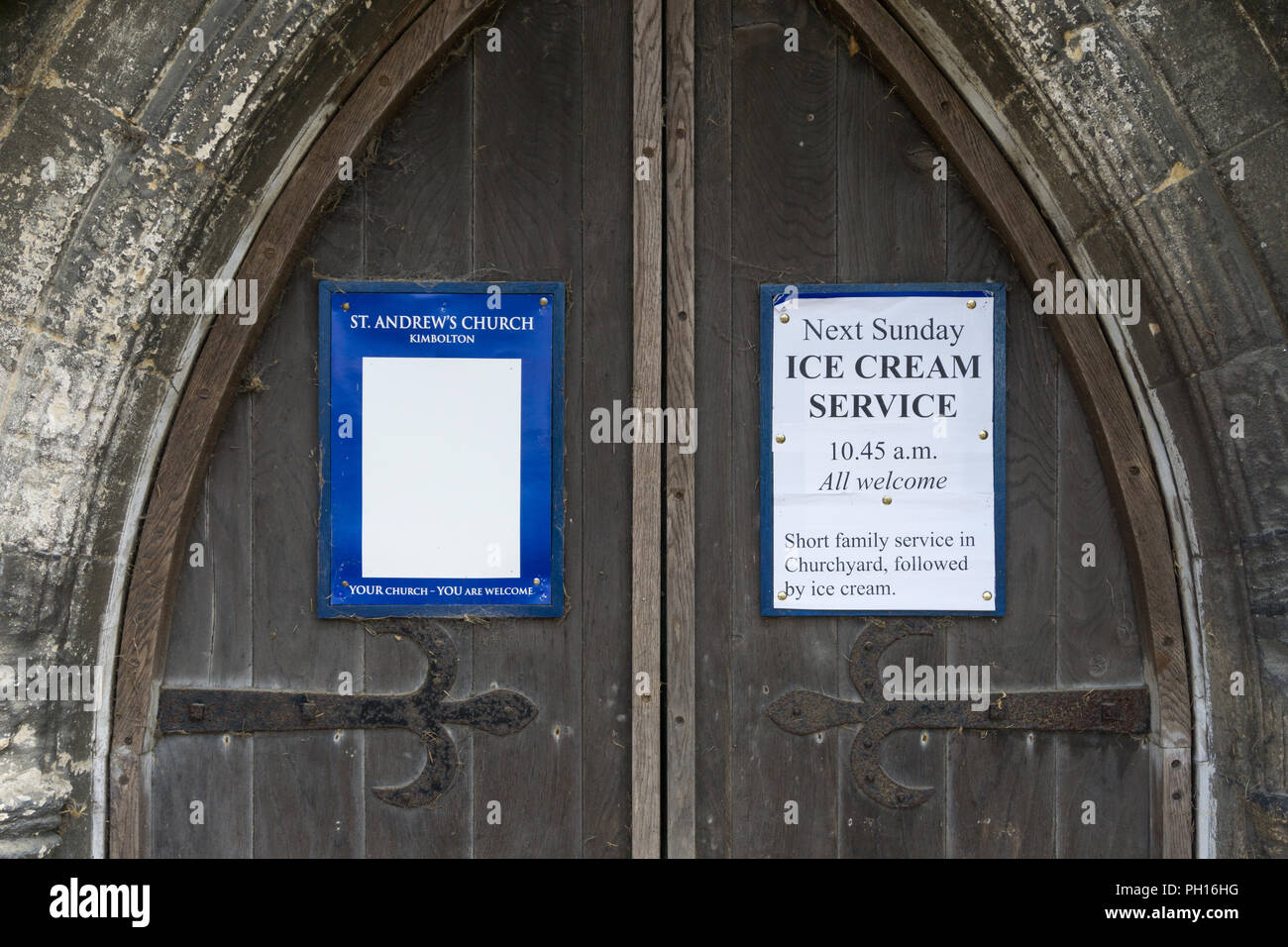 Sign on a church door announcing "ice cream service", a church service ...
