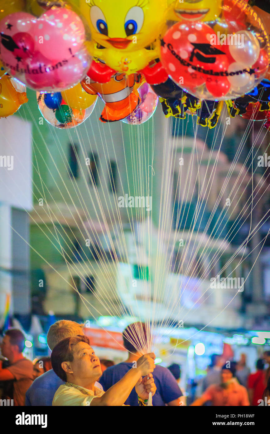 Cartoon balloons seller hi-res stock photography and images - Alamy