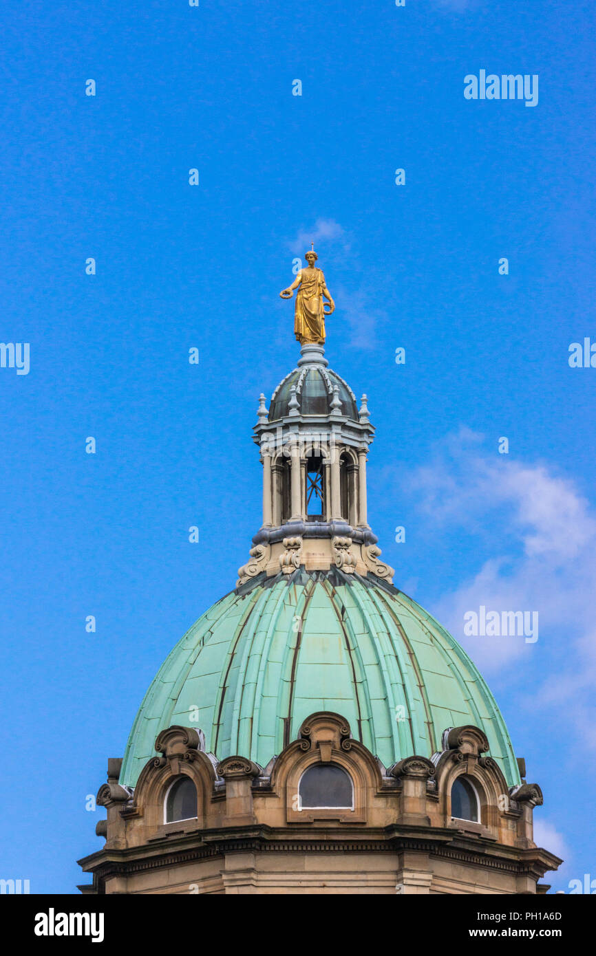 Edinburgh, Scotland, UK - June 14, 2012: Golden statue of female ...
