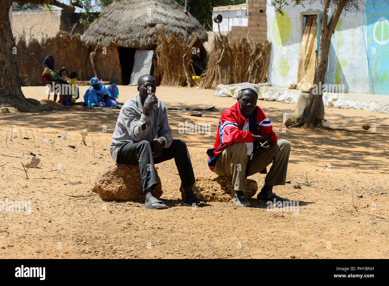 ROAD TO LAMPOUL, SENEGAL - APR 23, 2017: Unidentified Senegalese two ...