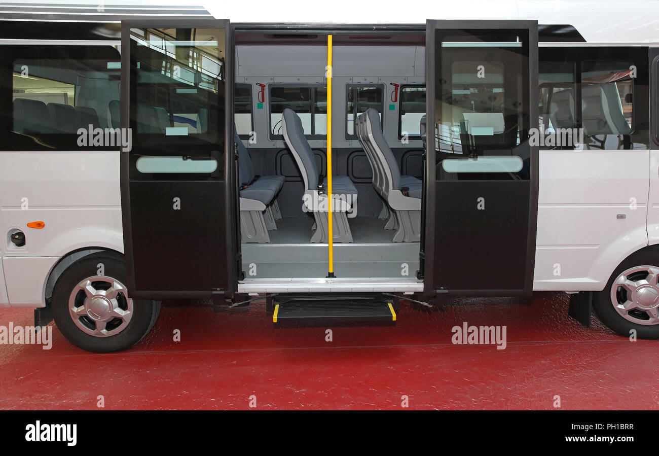 Open double doors at regional mini bus Stock Photo - Alamy