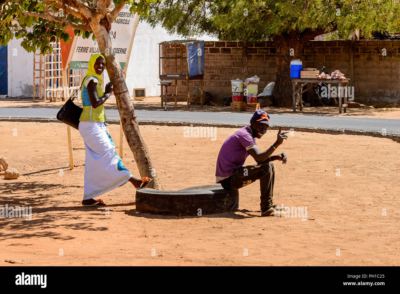 ROAD TO LAMPOUL, SENEGAL - APR 23, 2017: Unidentified Senegalese man ...