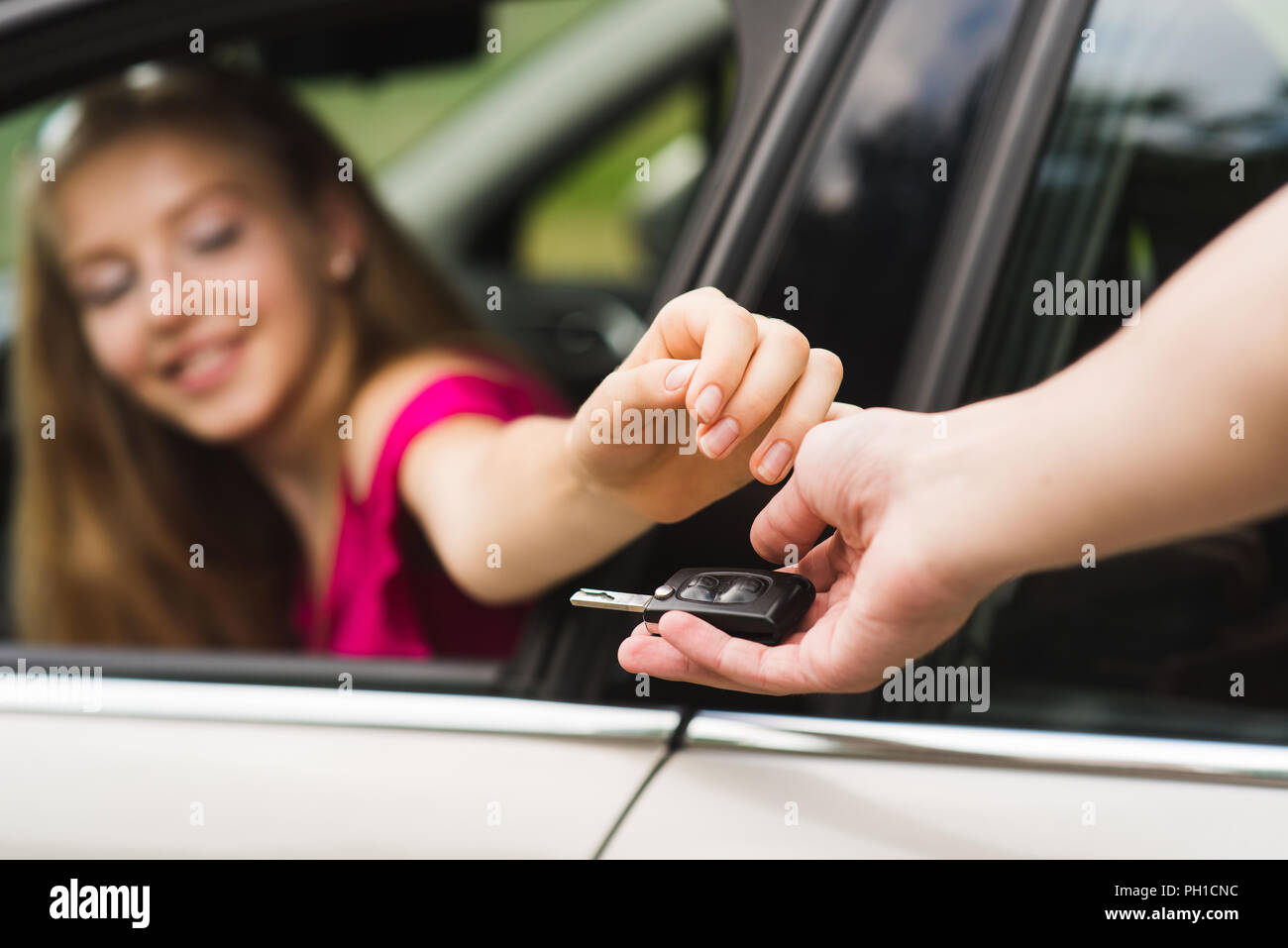 Human hands holding driving license hi-res stock photography and images ...