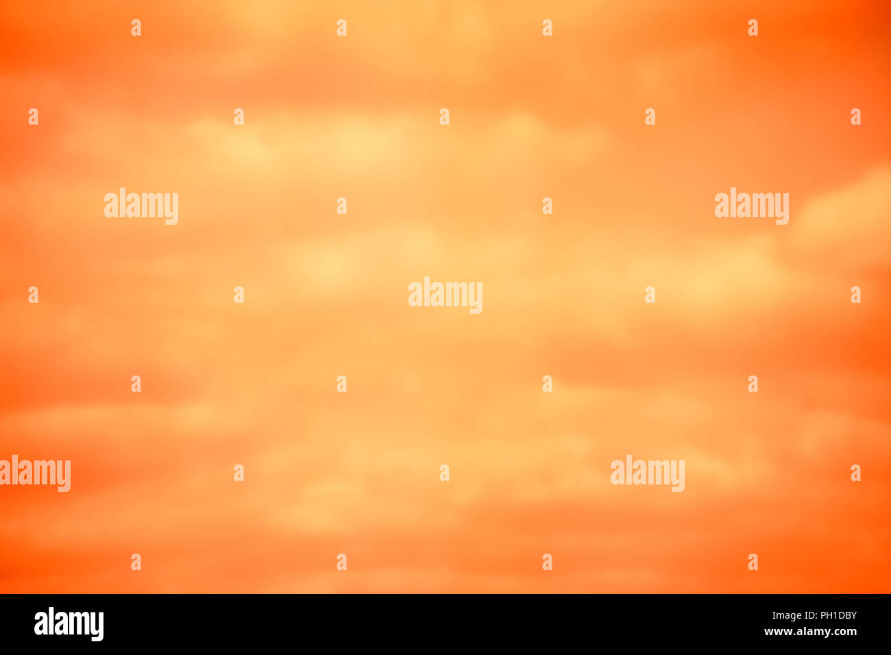 Clouds and the sky behind an orange-tinted windowpane Stock Photo - Alamy