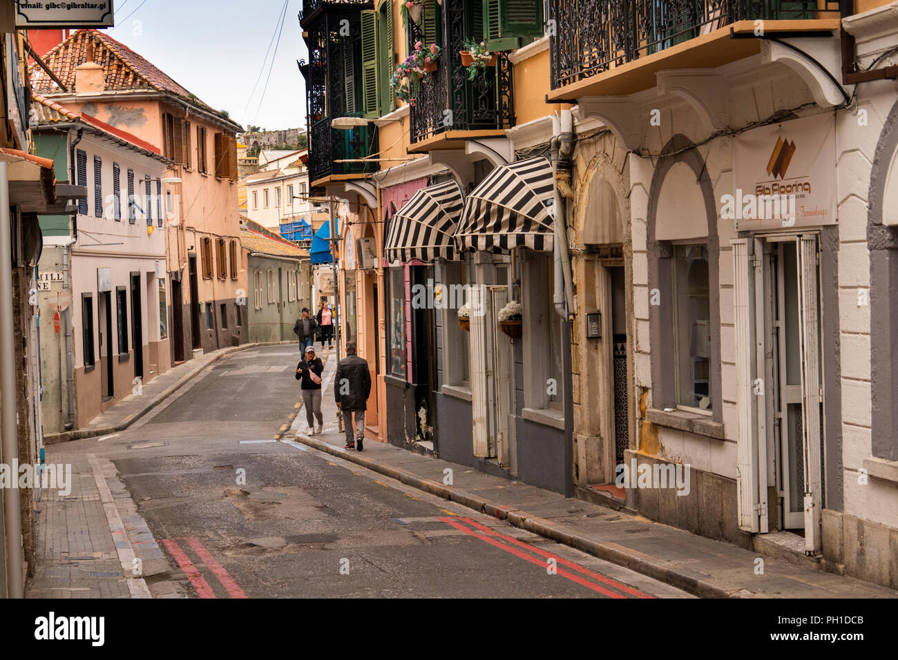 Gibraltar, Governor’s Street, shops in local trading area on slopes of ...