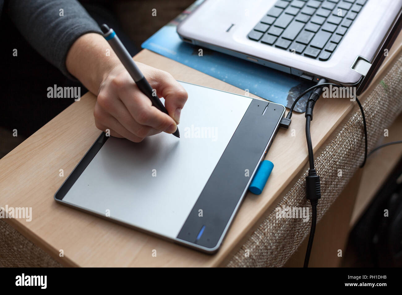 Drawing board with women hand using pad and laptop, close up Stock ...
