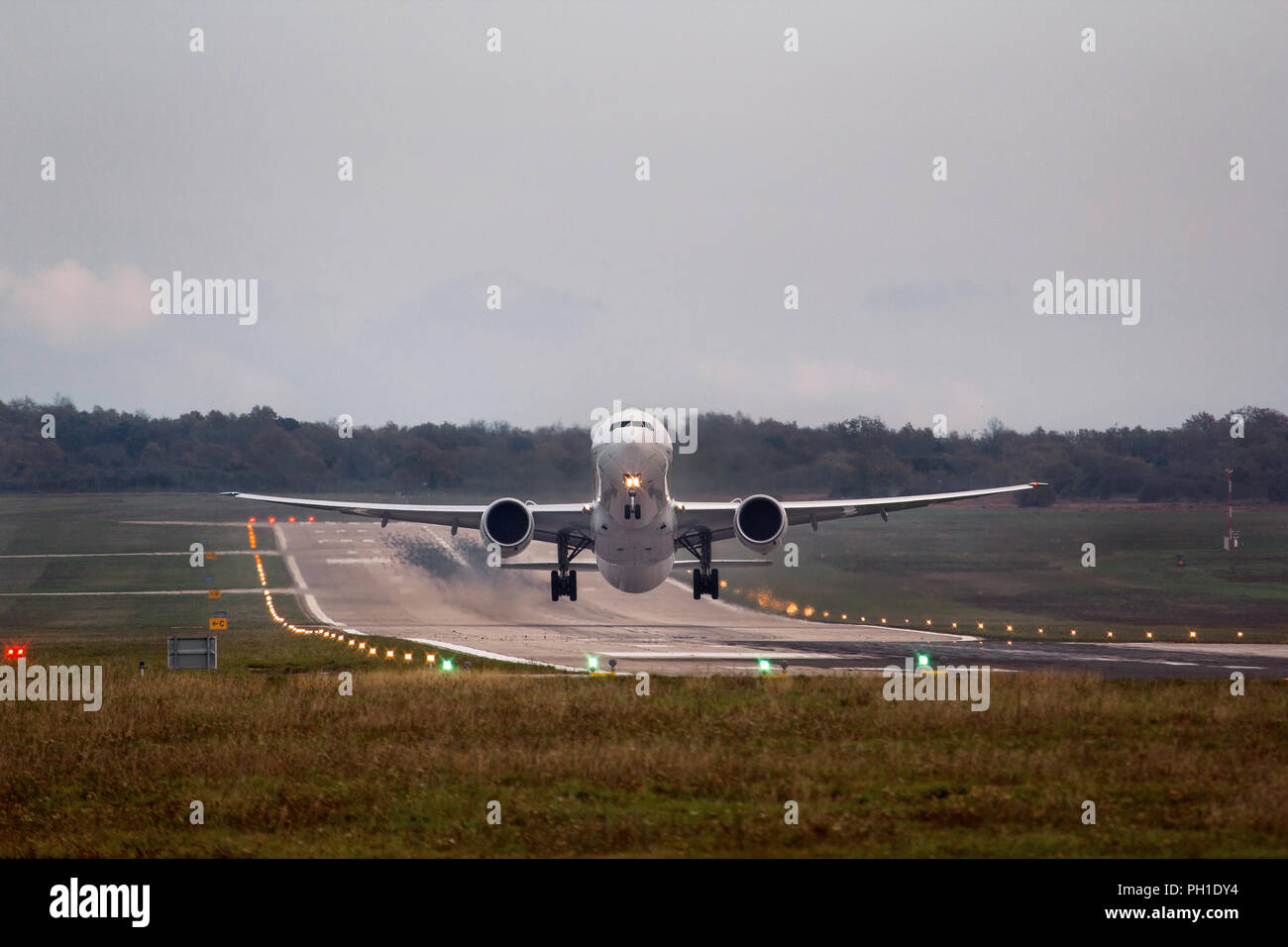 Airplane moments after takeoff, with beautiful environment. Leaving ...