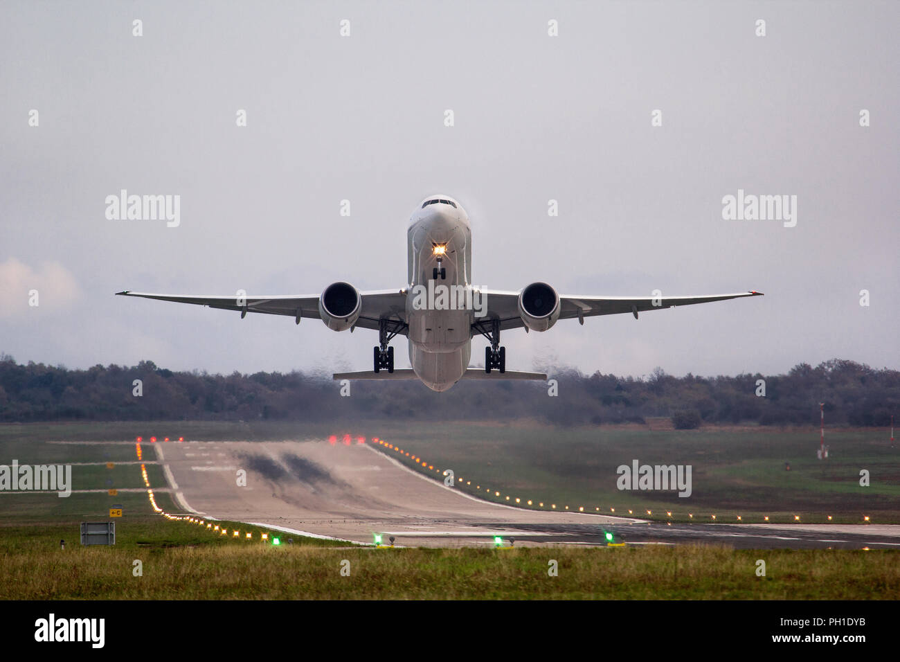 Airplane moments after takeoff, with beautiful environment. Leaving ...