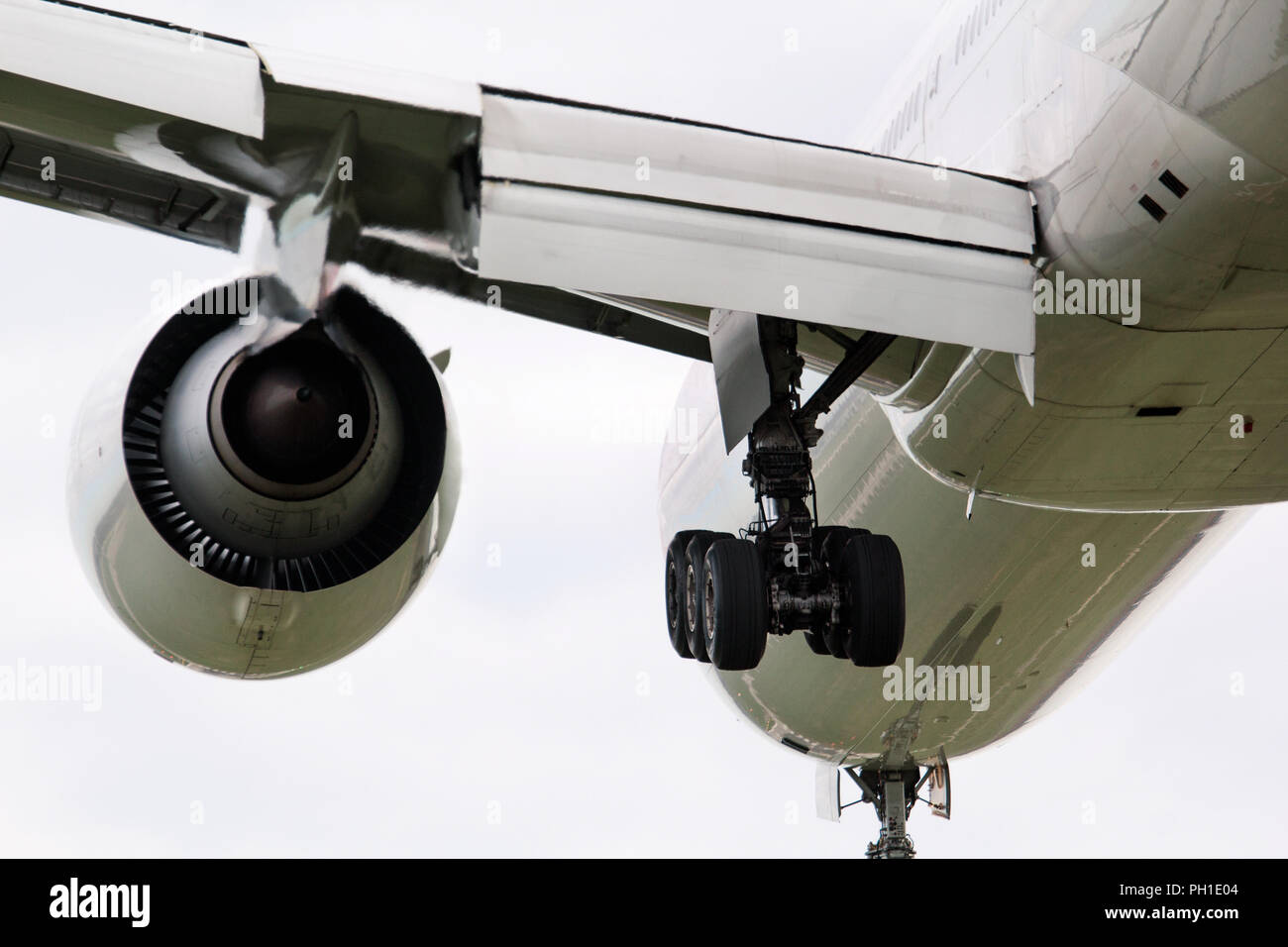 Detail of aircraft engine, flaps and landing gears, close up. Moments ...