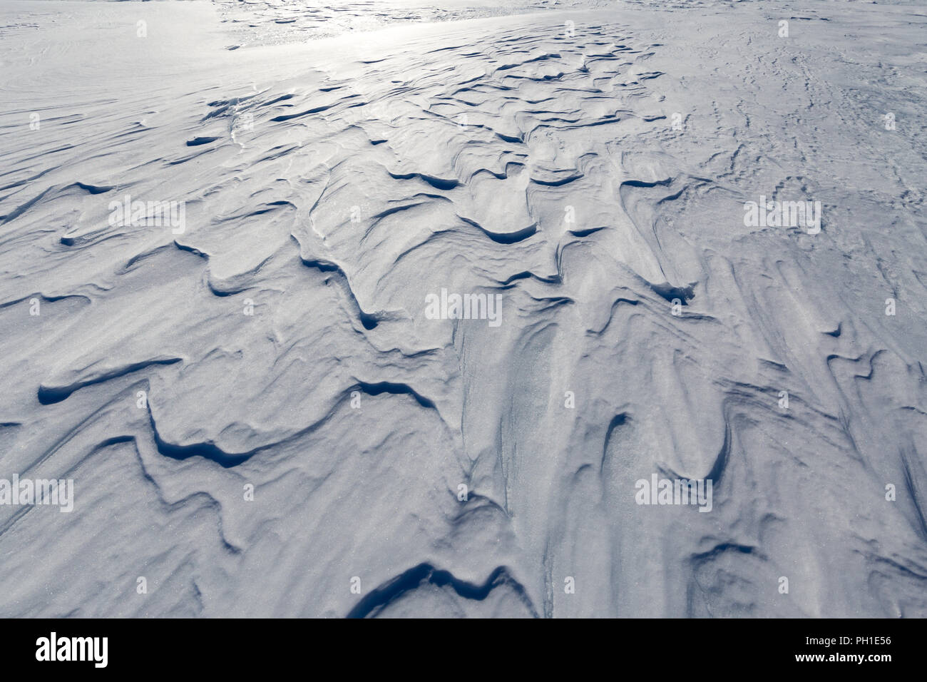 The snow and ice surface shaped by the Antarctic winds Stock Photo - Alamy