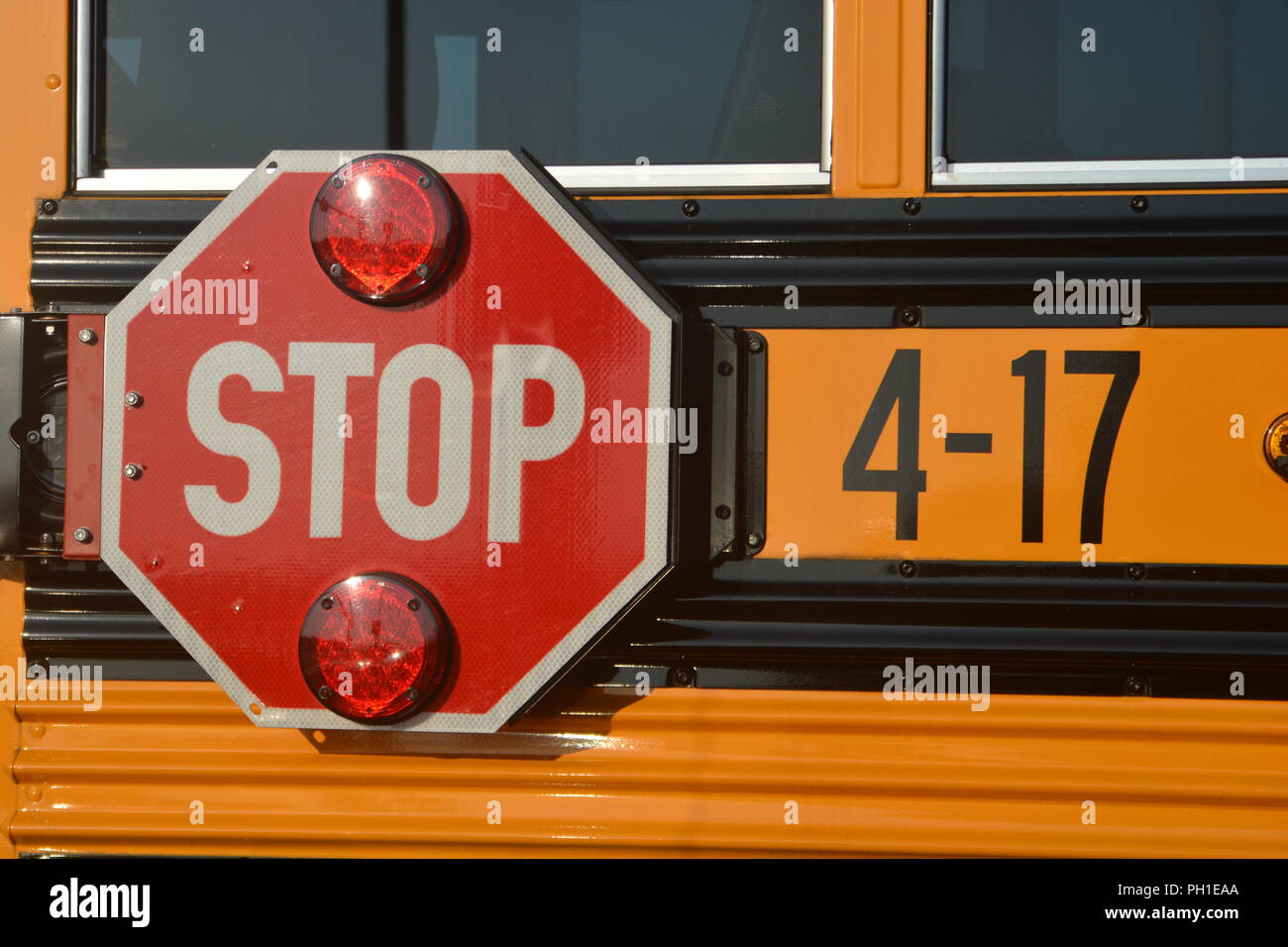 Stop sign on a School bus Stock Photo - Alamy