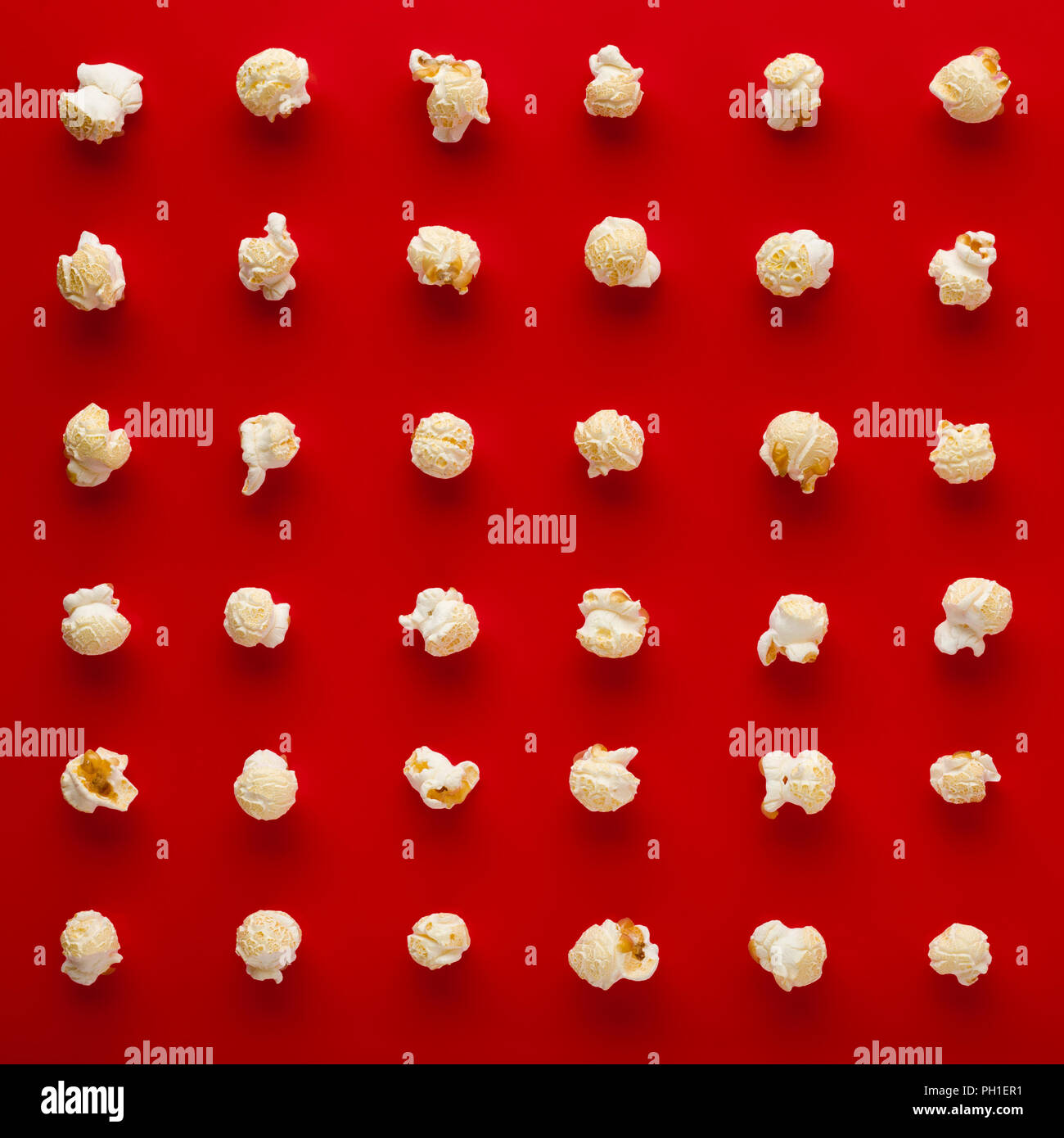 popcorn on red background, copy space Stock Photo - Alamy