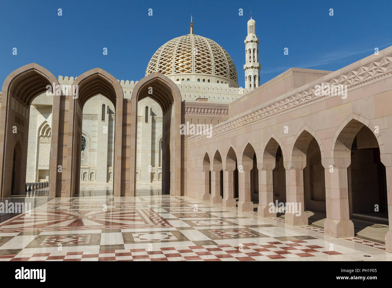 Tiled courtyard of Sultan Qaboos Grand Mosque, Muscat Oman Stock Photo ...
