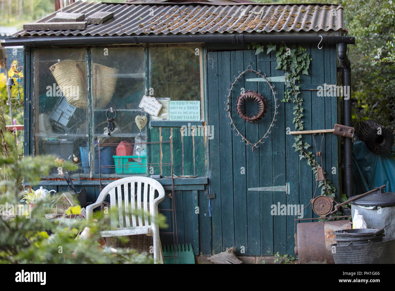 Shed with interesting and creative artefacts and other objects Stock ...